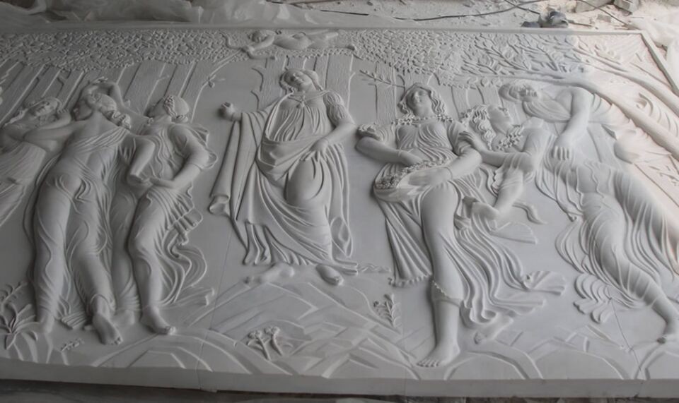 white marble carved panel by hand